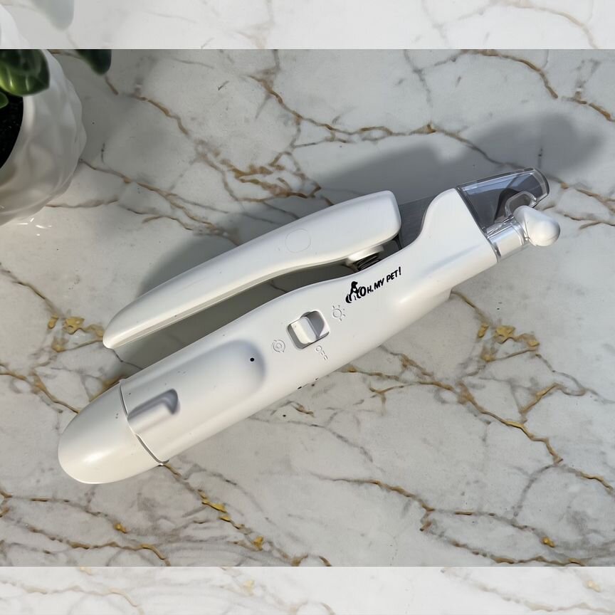 Когтерезка с подсветкой для кошек и собак 4 в 1