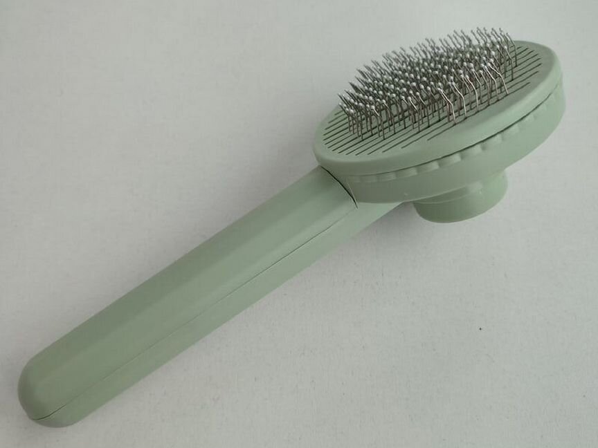 Расчёска для животных с кнопкой самоочистки