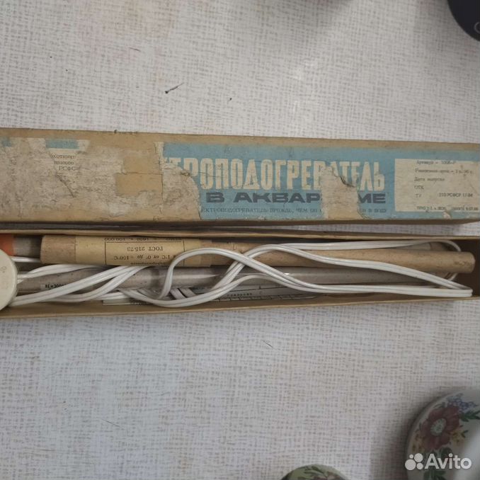 Электроподогреватель в аквариум