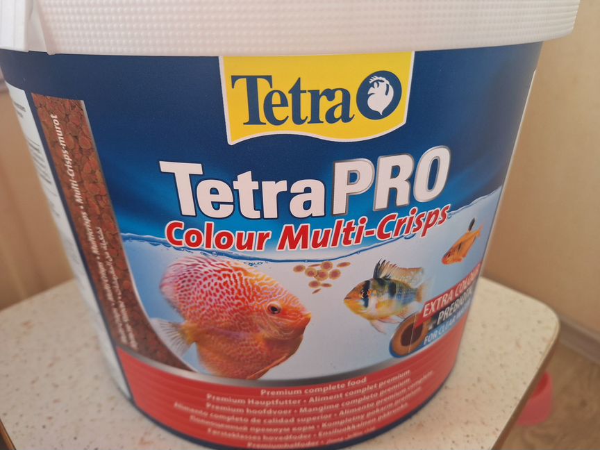 Корм для рыб Tetra pro color и автокормушка Resun