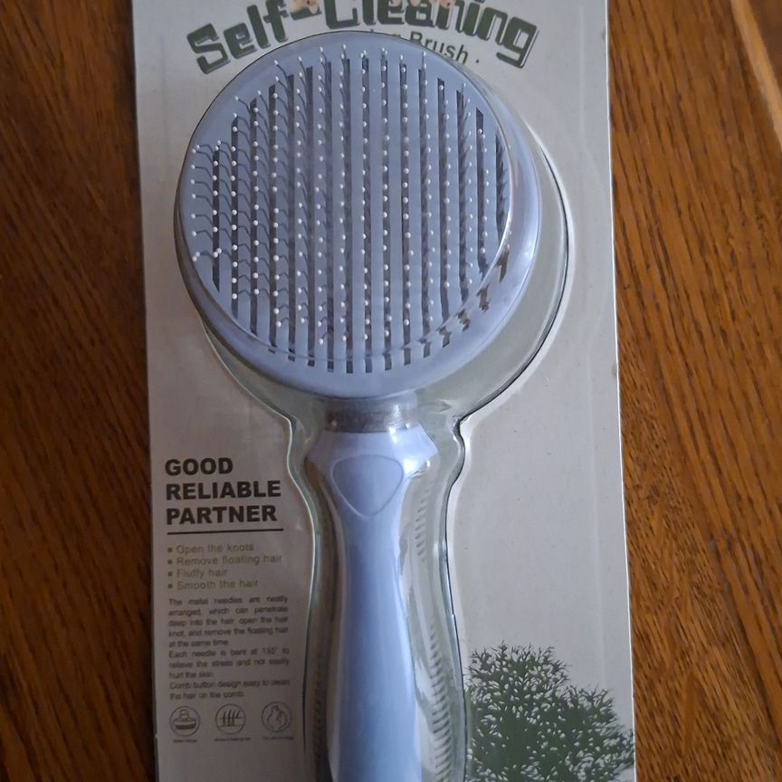 Щётка для вычесывания шерсти собак и кошек